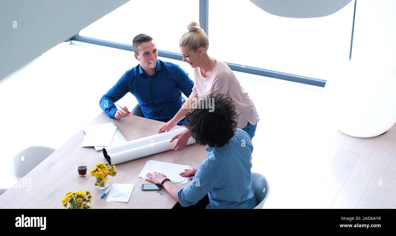 Startup Business Team At A Meeting at modern office building Stock ...