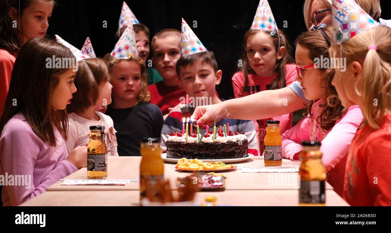 The young boy joyfully celebrating his birthday Stock Photo - Alamy