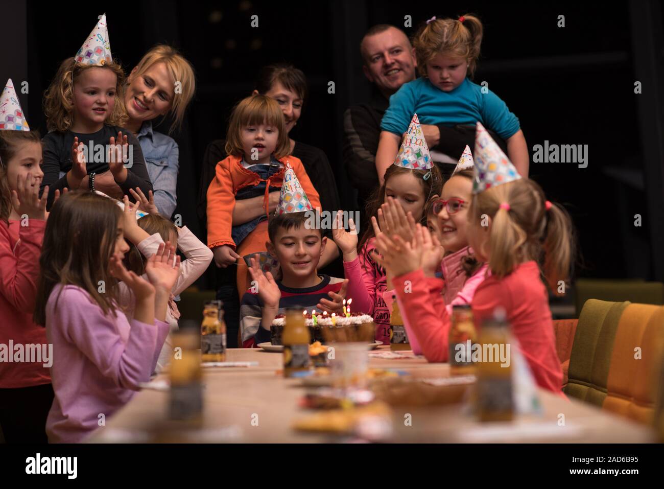 The young boy joyfully celebrating his birthday Stock Photo - Alamy