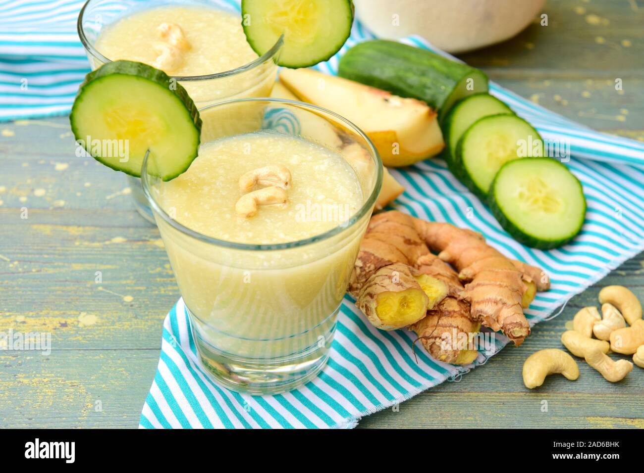 healthy vegan raw coconut water ginger cucumber pear juice with cashew ...