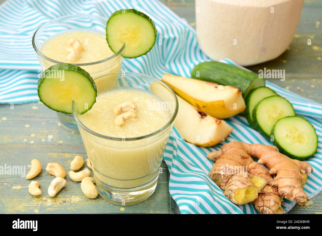 healthy vegan raw coconut water ginger cucumber pear juice with cashew ...