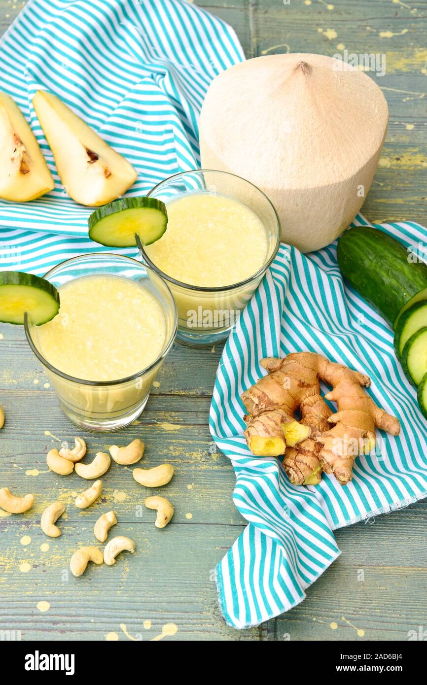 healthy vegan raw coconut water ginger cucumber pear juice with cashew ...