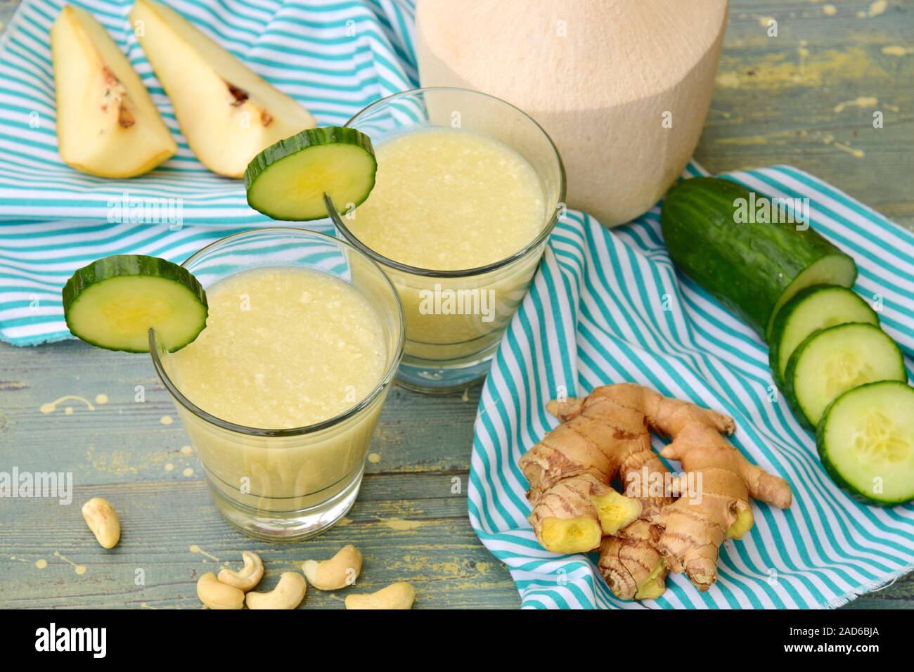 healthy vegan raw coconut water ginger cucumber pear juice with cashew ...
