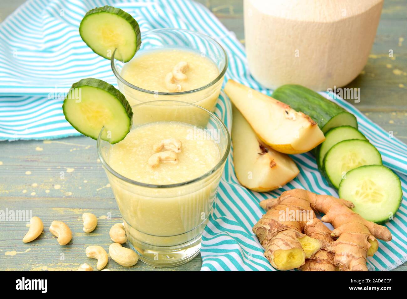 healthy vegan raw coconut water ginger cucumber pear juice with cashew ...