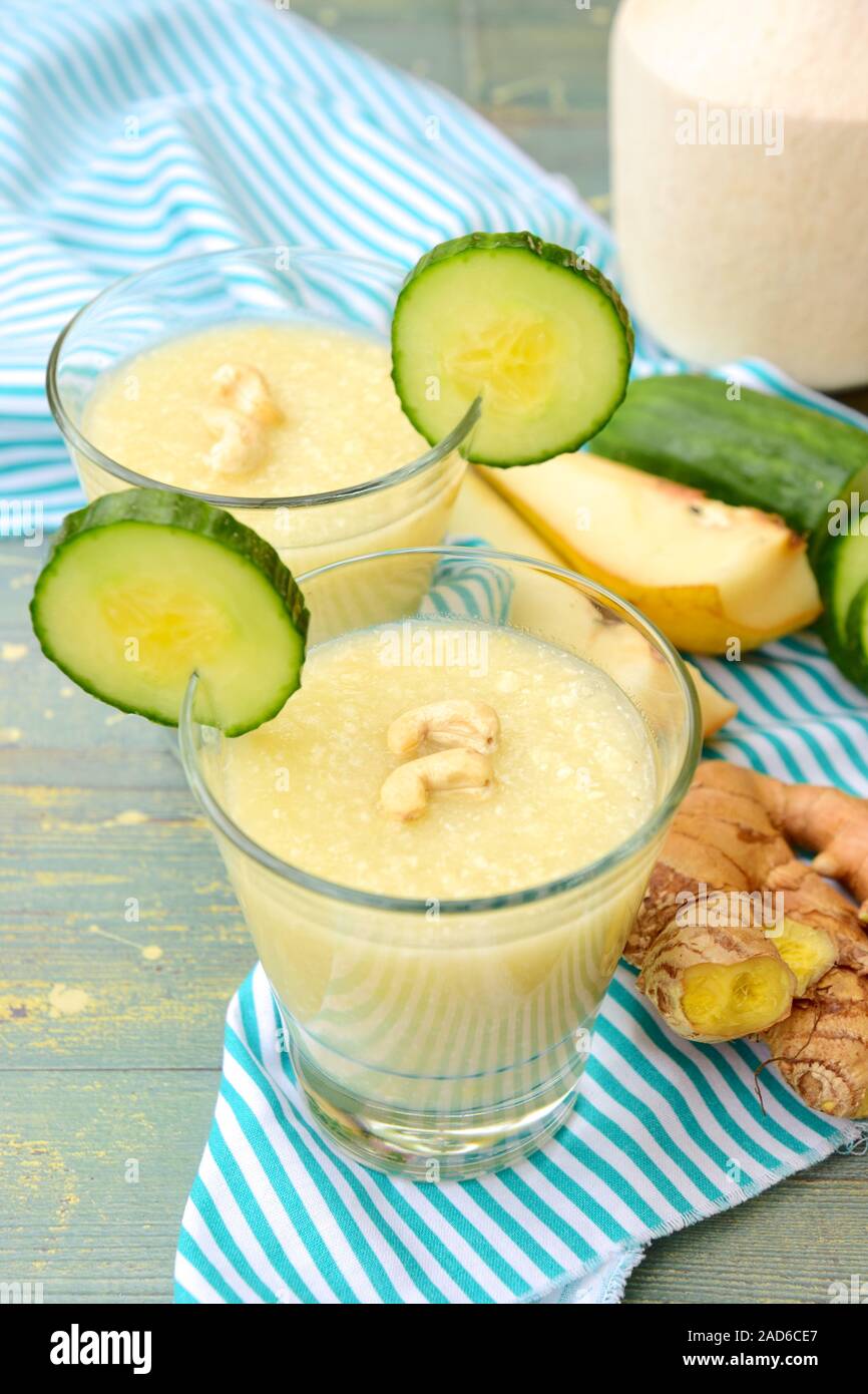 healthy vegan raw coconut water ginger cucumber pear juice with cashew ...