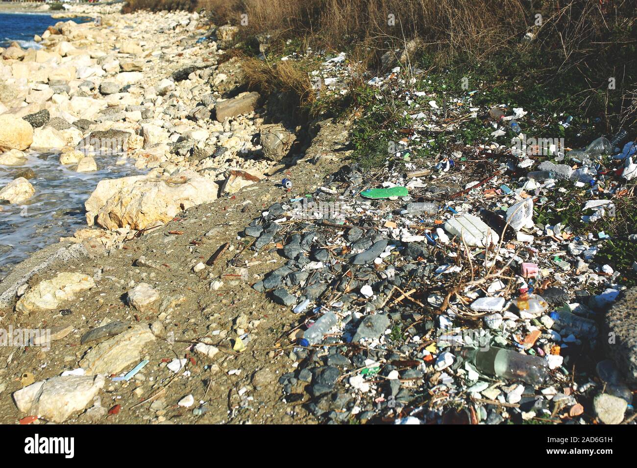 Beach pollution near see Lot of rubbish, waste, rubber tyre and single ...