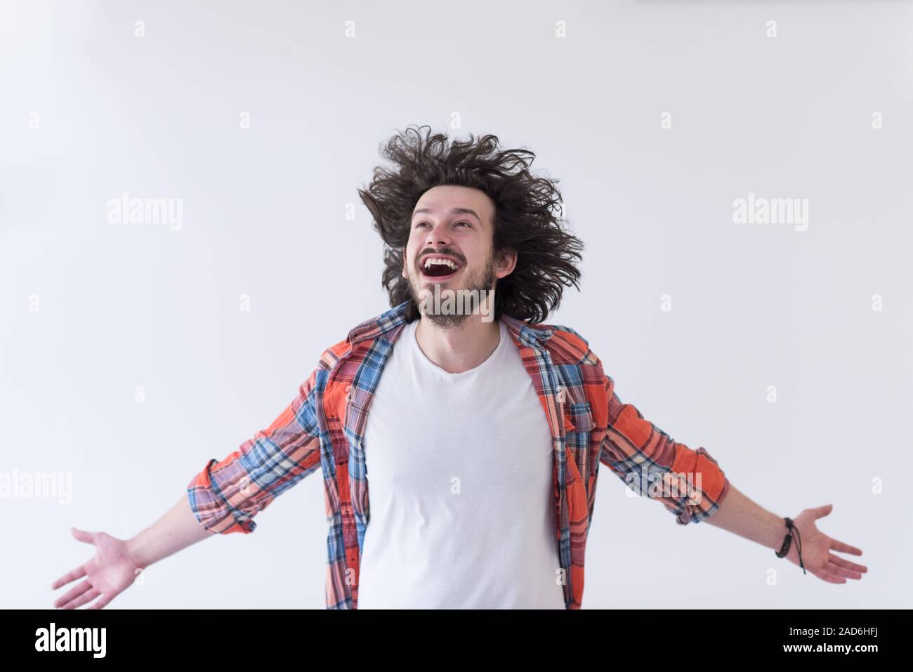 man standing with open arms isolated on a white Stock Photo - Alamy
