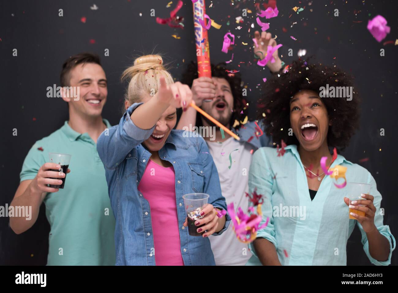 confetti party multiethnic group of people Stock Photo - Alamy