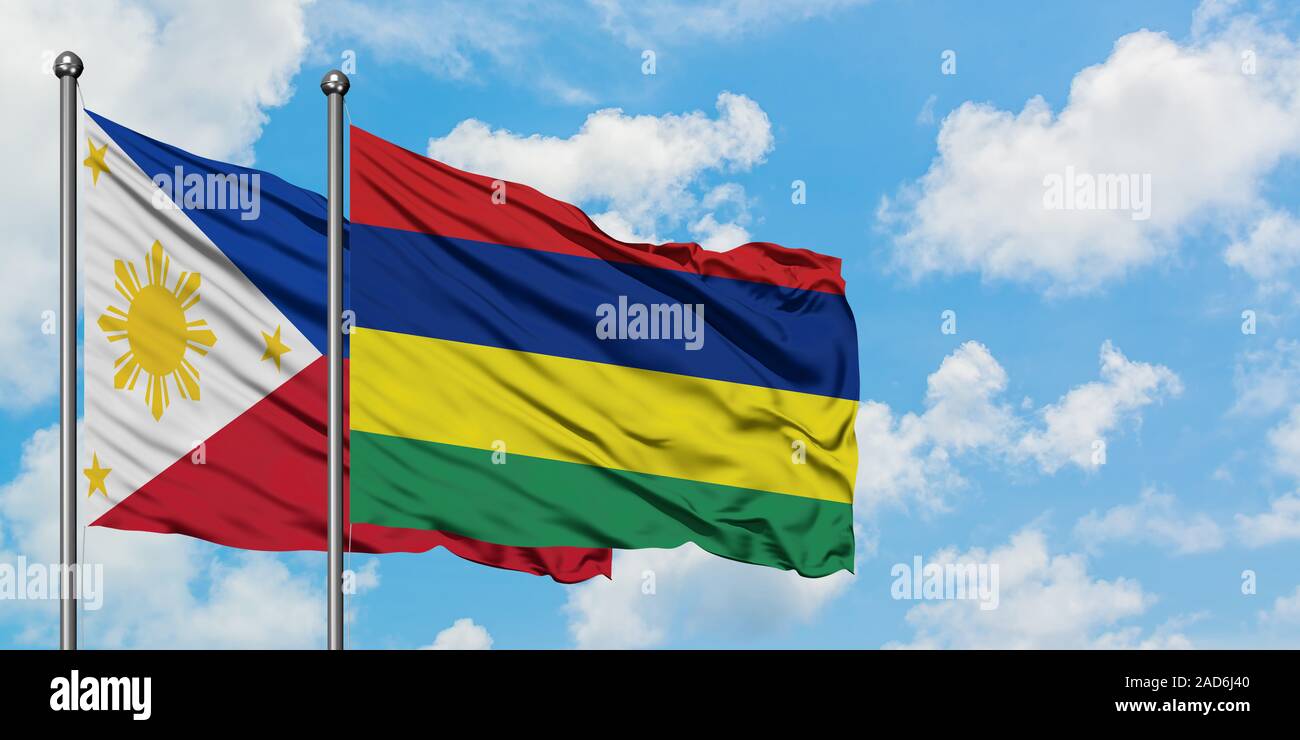 Philippines and Mauritius flag waving in the wind against white cloudy ...