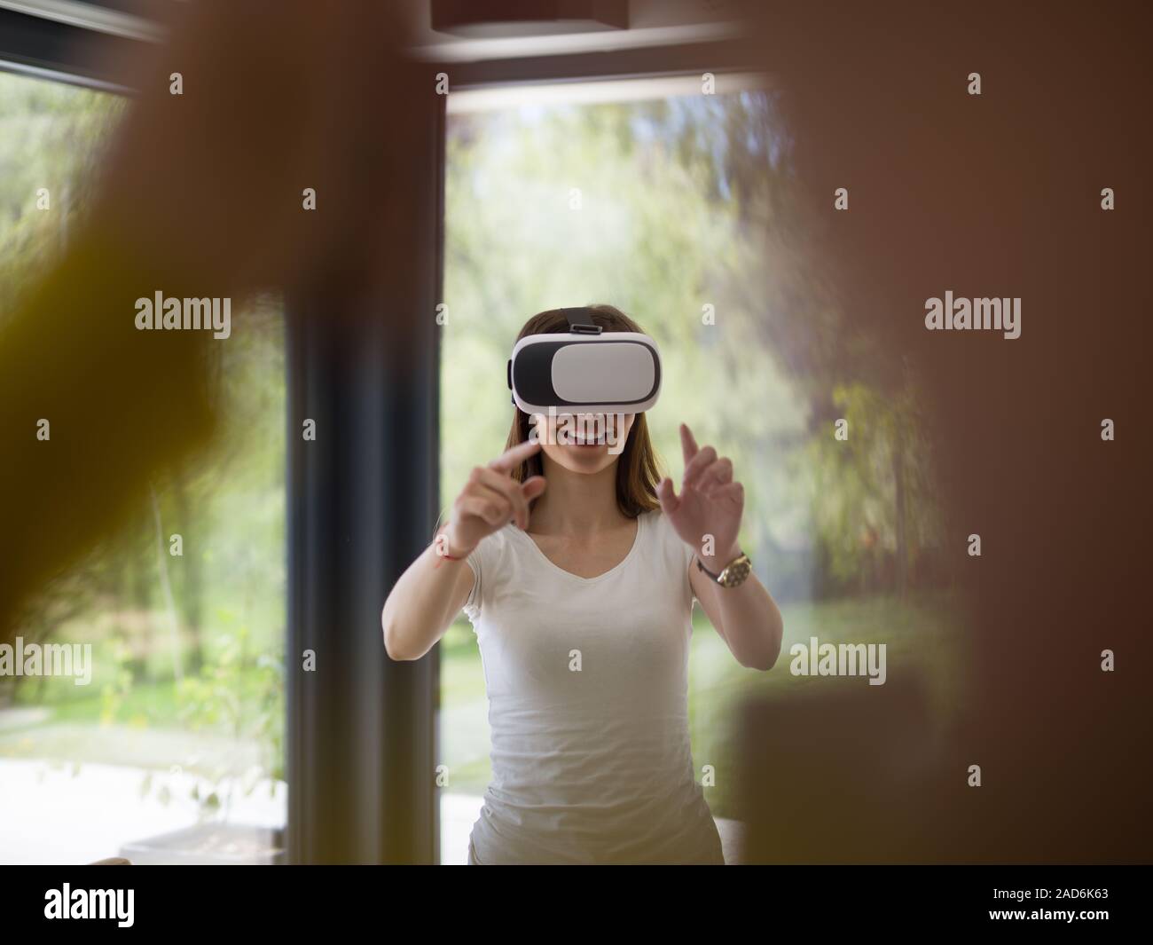 woman using VR-headset glasses of virtual reality Stock Photo - Alamy
