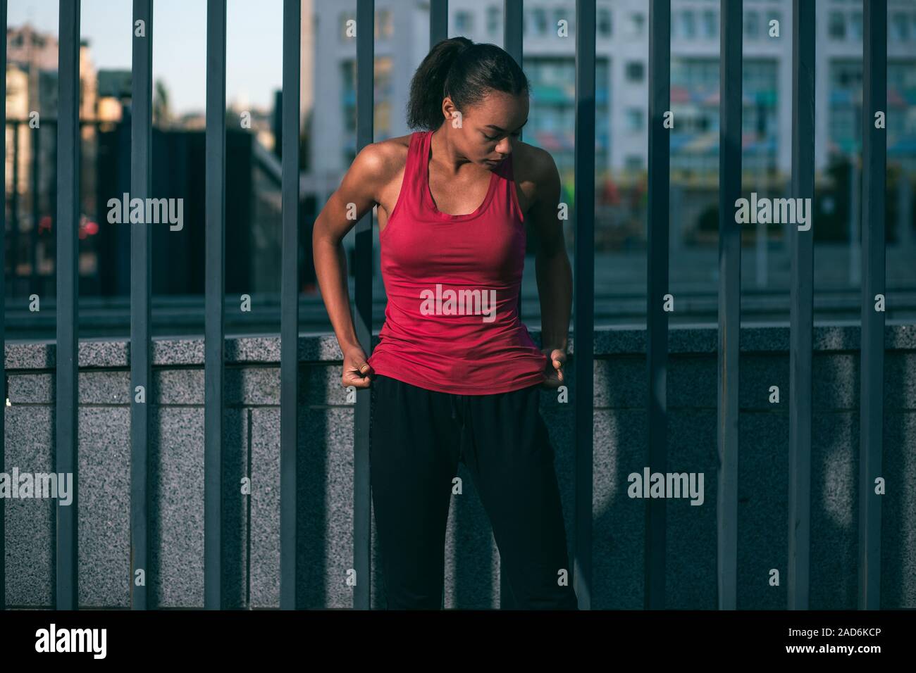 Pulling the shirt hi-res stock photography and images - Alamy