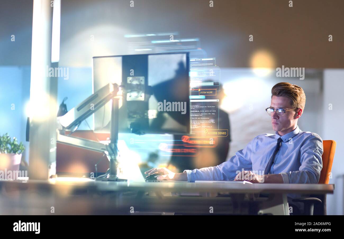 Person on computer dark hi-res stock photography and images - Alamy