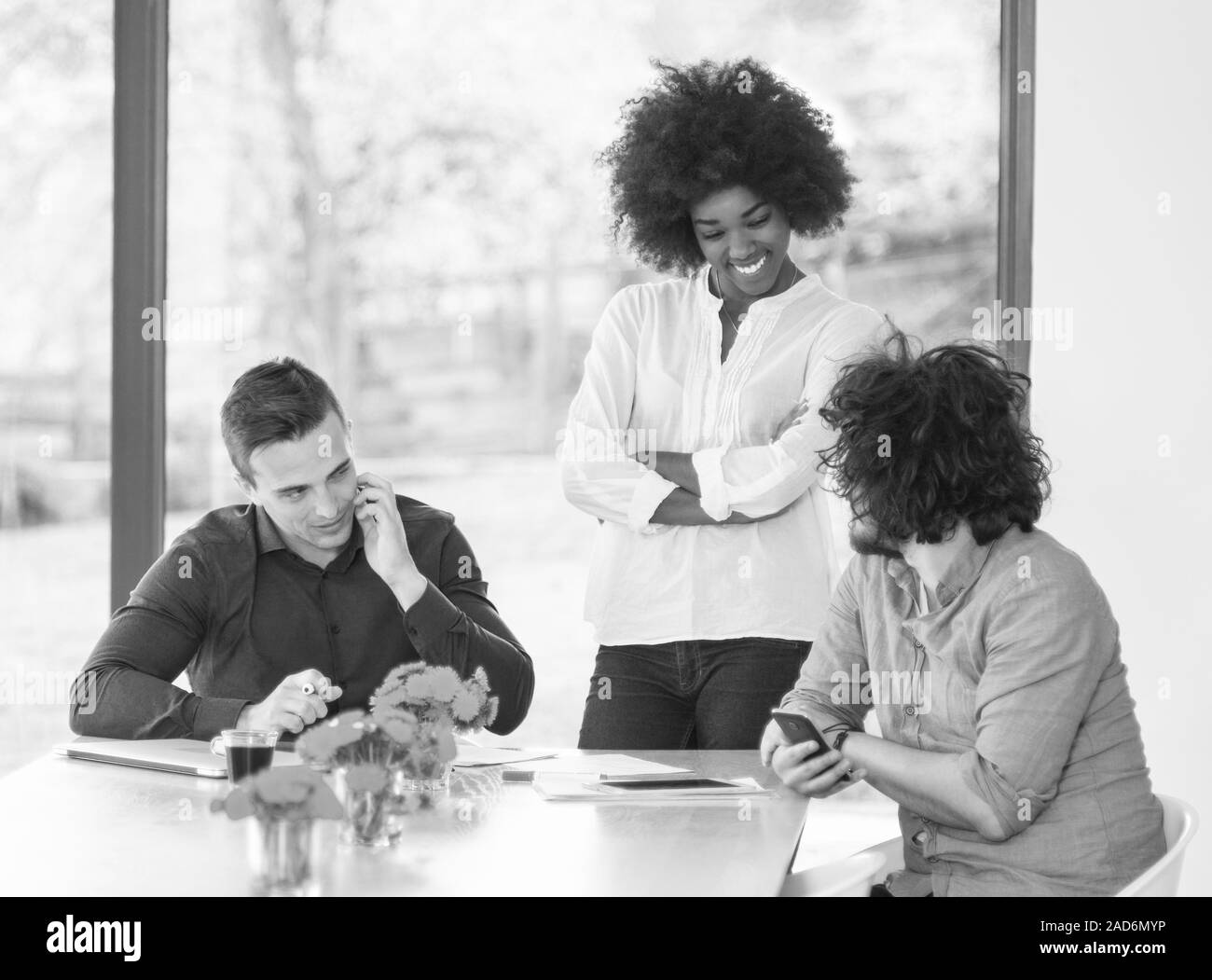 Young team at work Stock Photo - Alamy