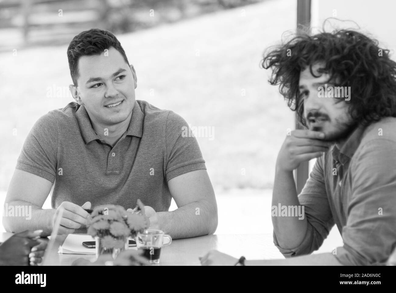 Smiling creative team working Black and White Stock Photos & Images - Alamy