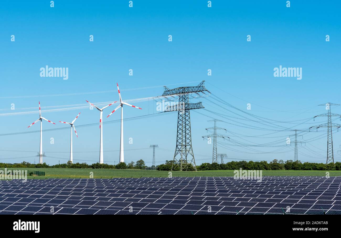 Solar energy panels, wind power and electricity pylons seen in Germany ...