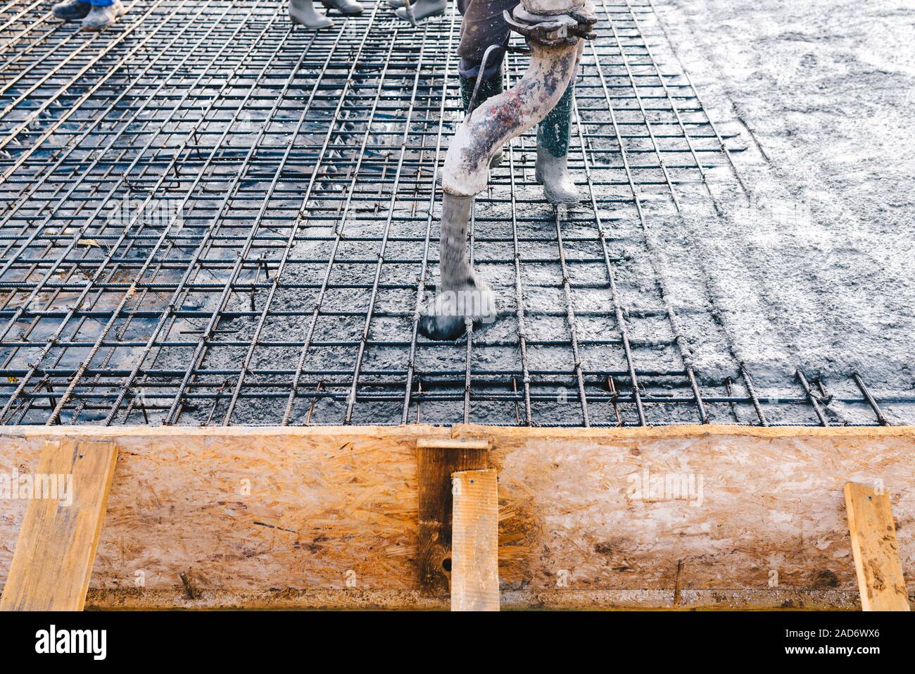 Concrete pouring during concreting floors of buildings in construction ...