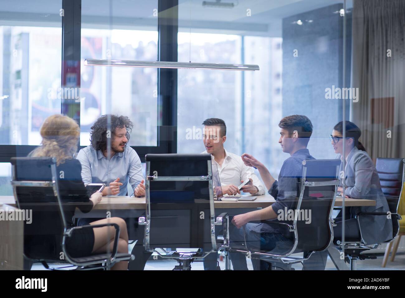 Startup Business Team At A Meeting at modern office building Stock ...