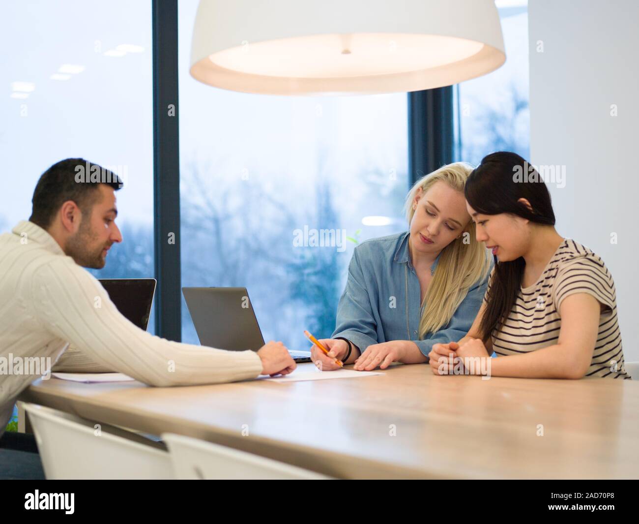 Startup Business team at a meeting in modern office building Stock ...