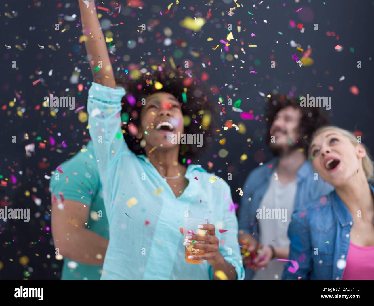 confetti party multiethnic group of people isolated over gray Stock ...