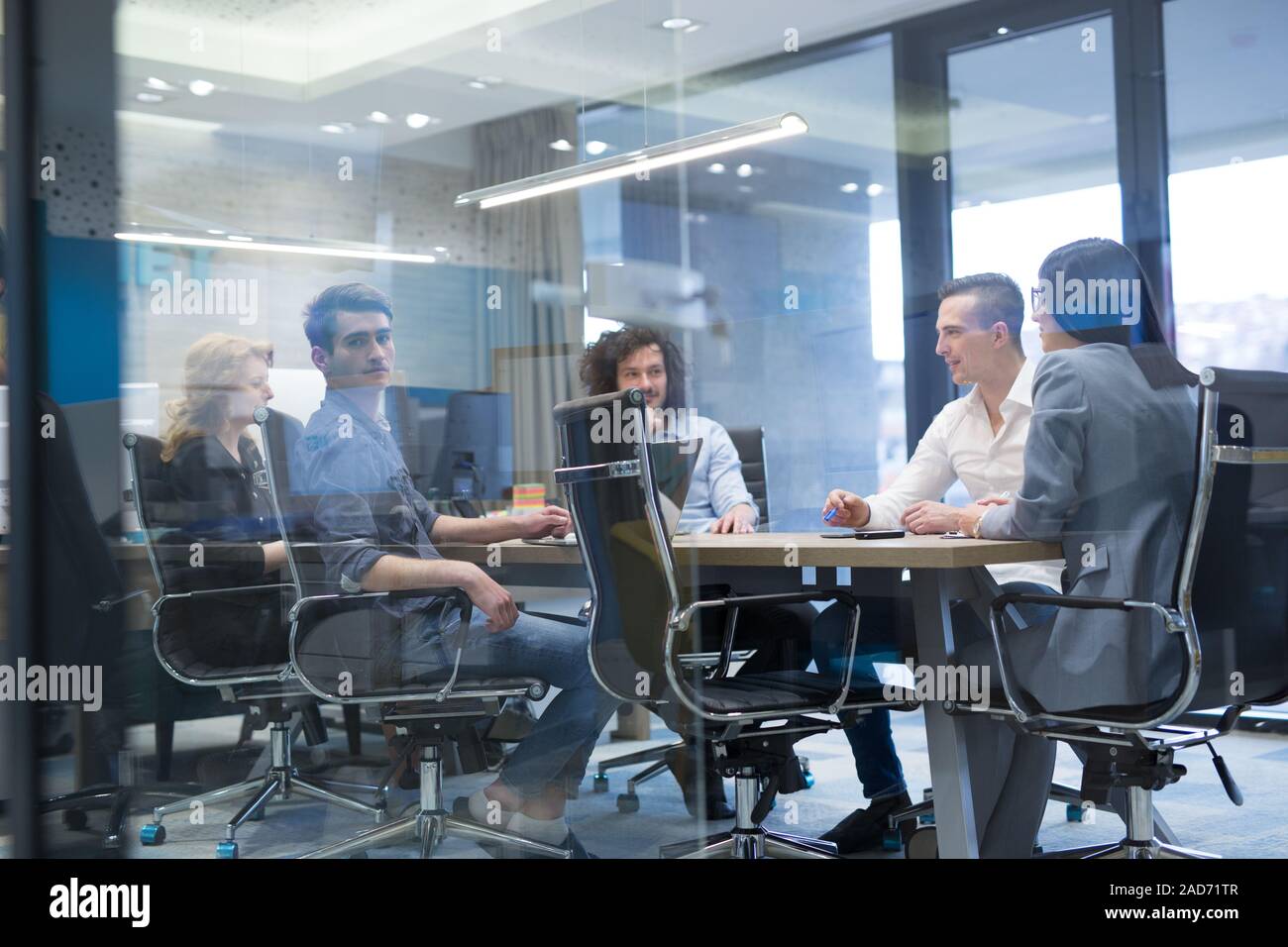 Startup Business Team At A Meeting at modern office building Stock ...