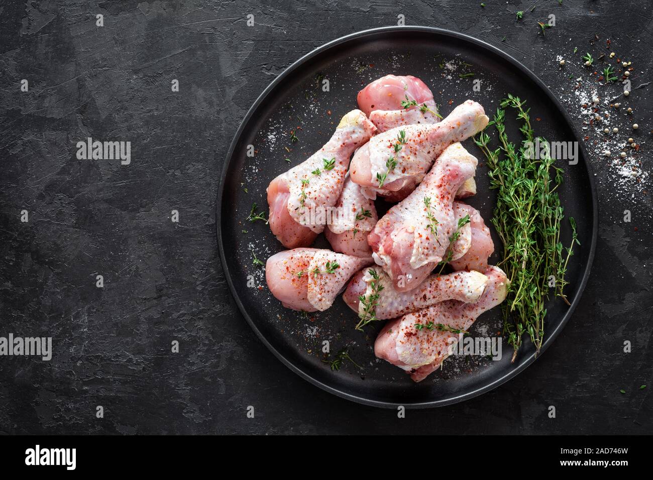 Raw marinated chicken meat, chicken legs Stock Photo - Alamy