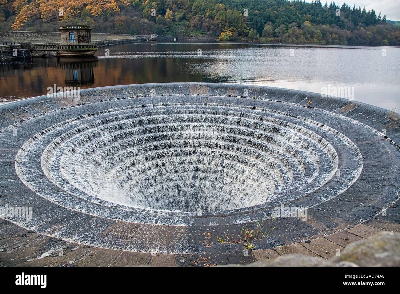 Large plughole at the Ladybower reservoir in overflow in the UK Stock ...