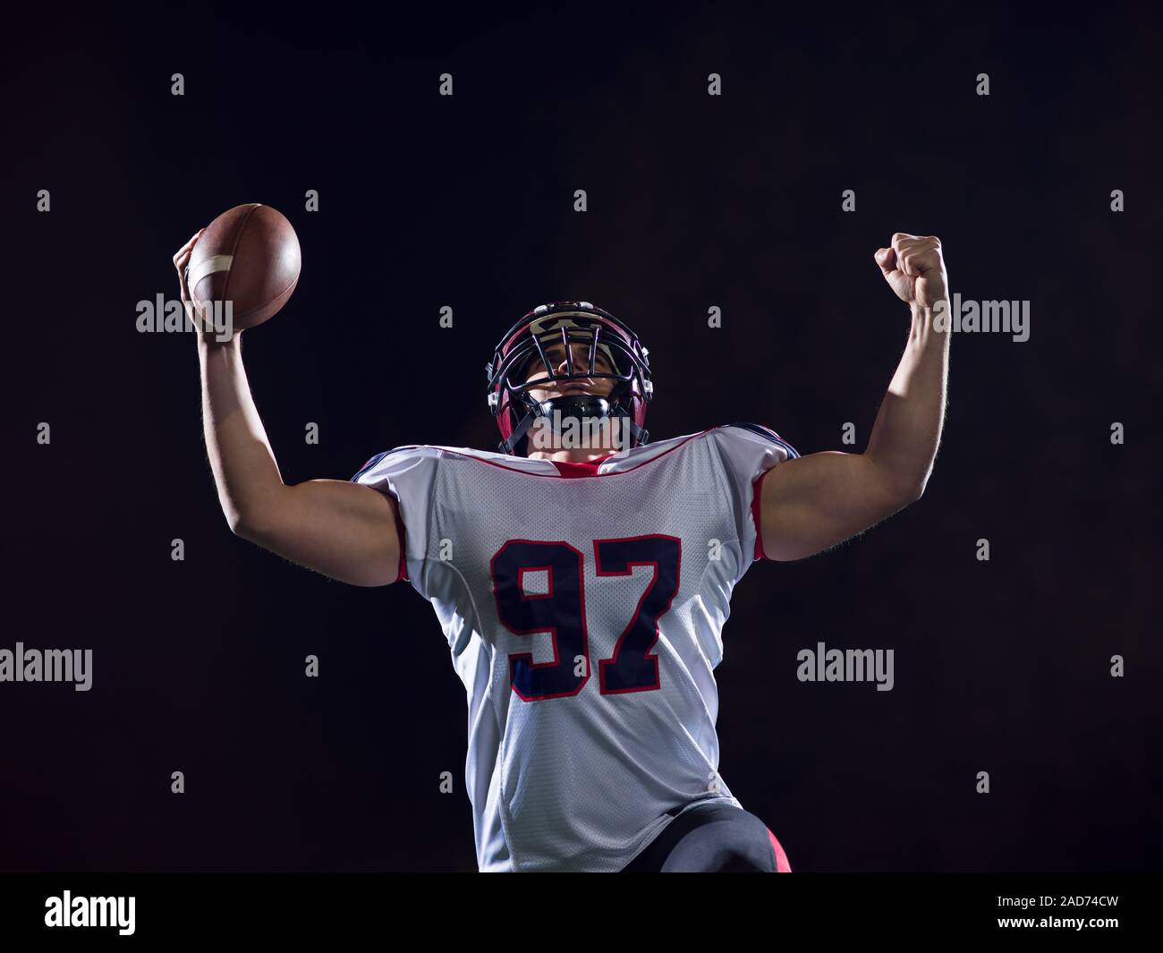 american football player celebrating after scoring a touchdown Stock ...