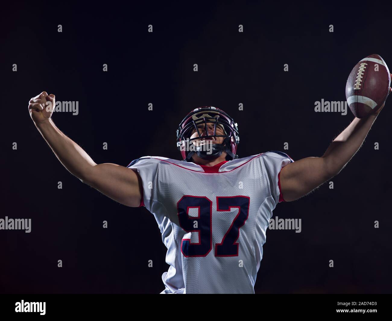 american football player celebrating after scoring a touchdown Stock ...