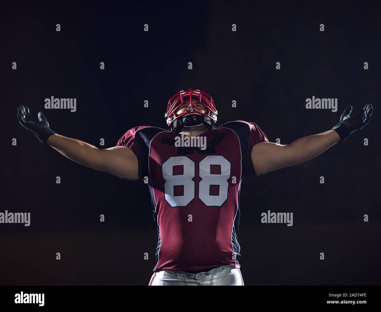american football player celebrating after scoring a touchdown Stock ...