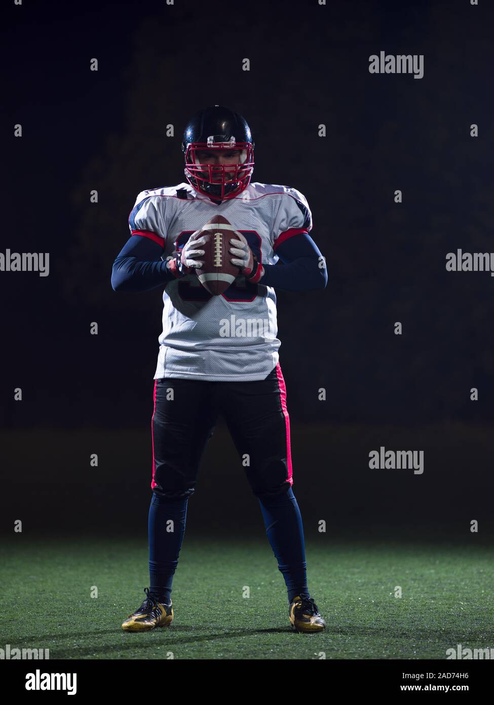 portrait of confident American football player Stock Photo - Alamy