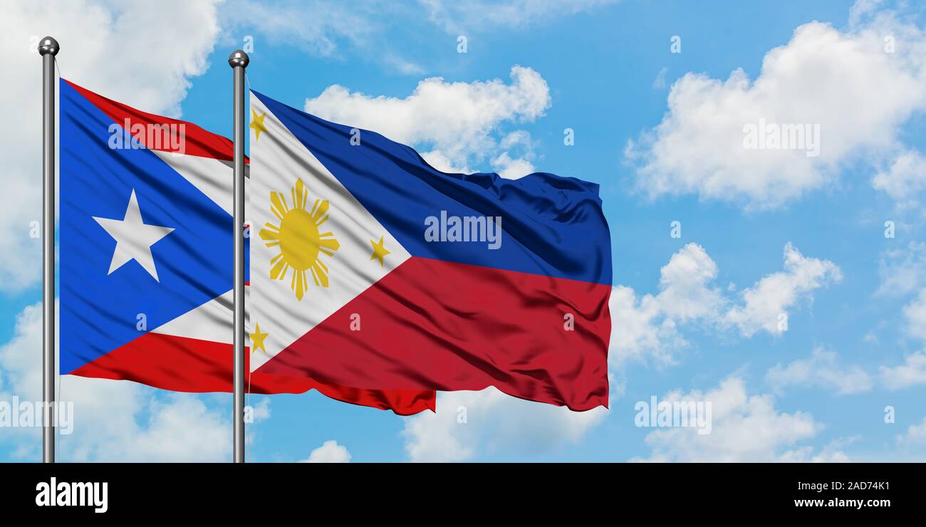 Puerto Rico and Philippines flag waving in the wind against white ...