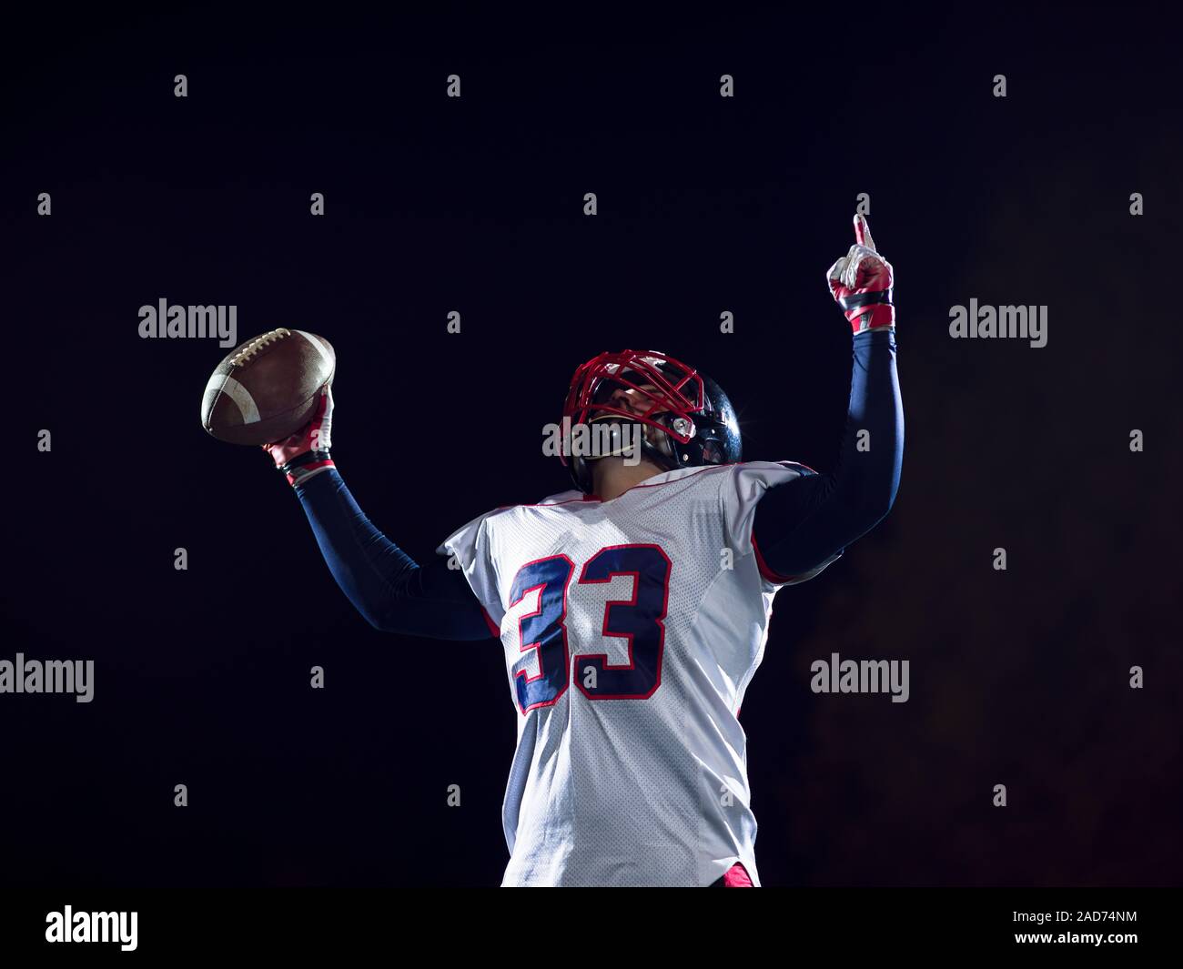 american football player celebrating after scoring a touchdown Stock ...