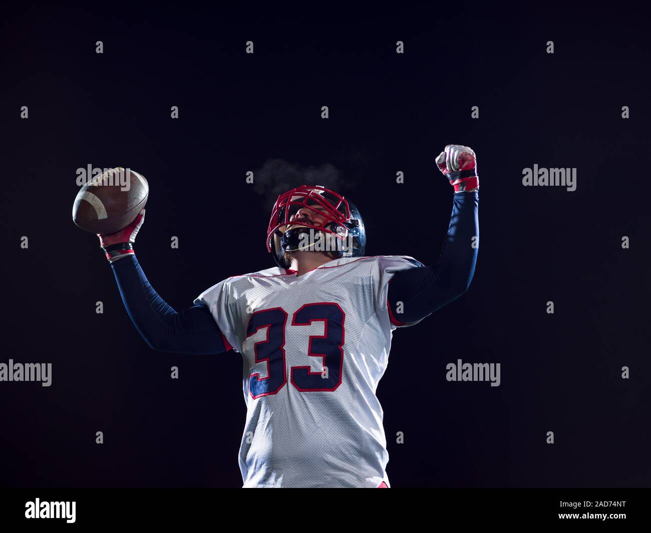 american football player celebrating after scoring a touchdown Stock ...