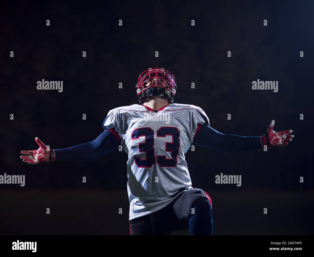 american football player celebrating after scoring a touchdown Stock ...