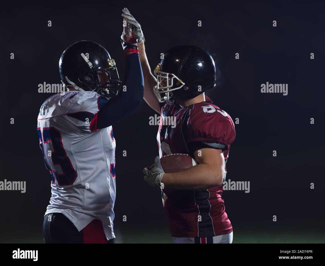 american football players celebrating after scoring a touchdown Stock ...