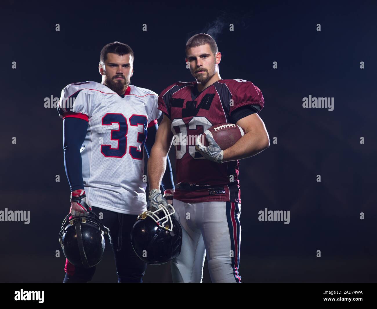 portrait of confident American football players Stock Photo - Alamy