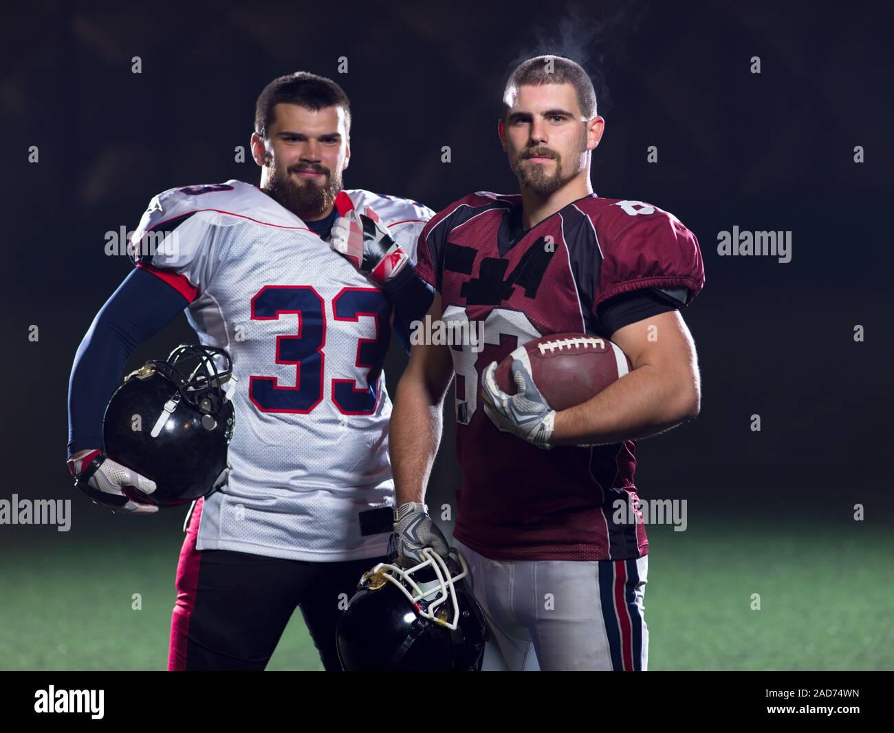 portrait of confident American football players Stock Photo - Alamy