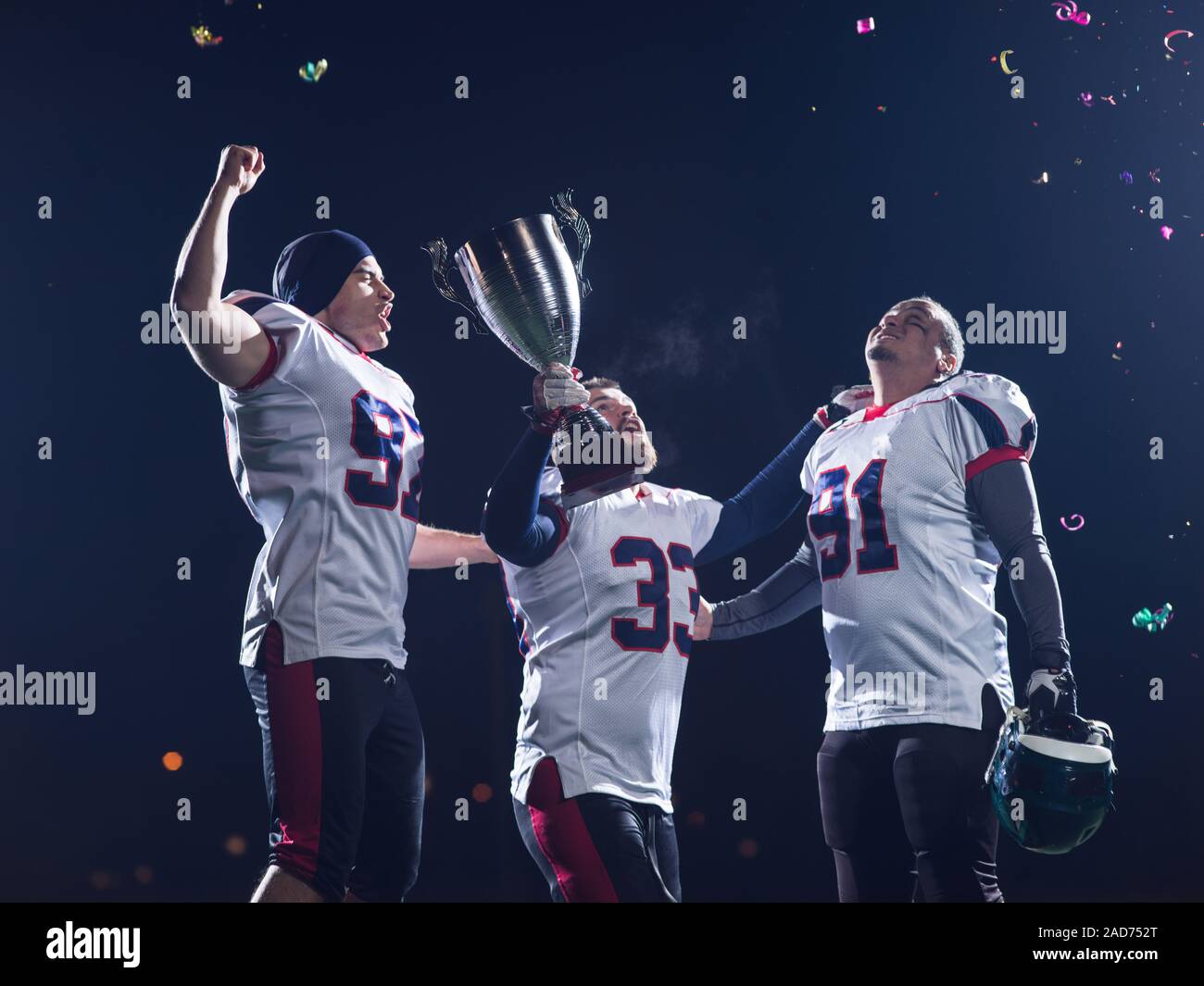 american football team celebrating victory Stock Photo - Alamy
