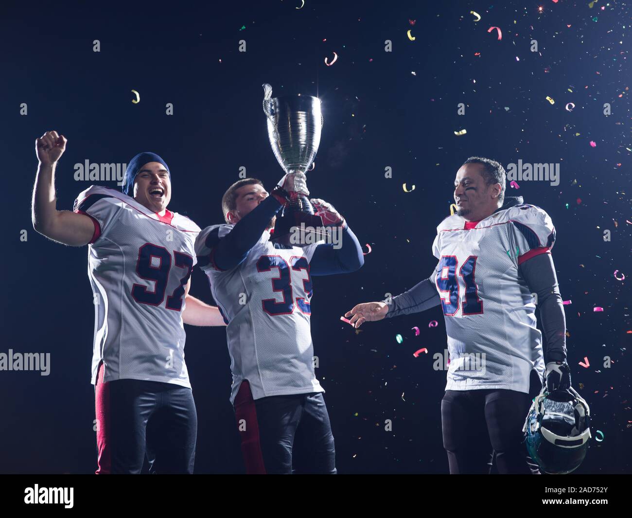 american football team celebrating victory Stock Photo - Alamy