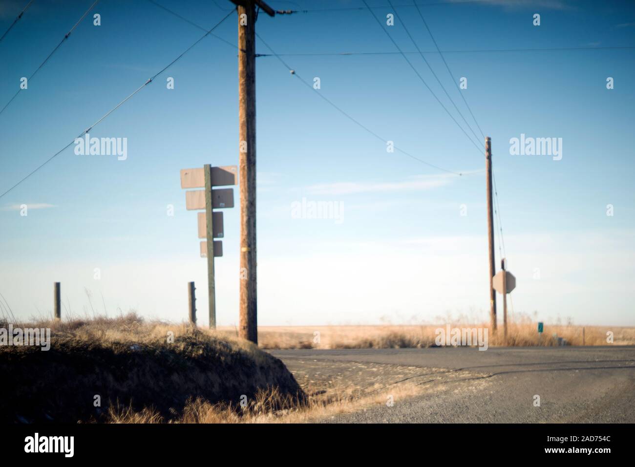 Rural Gravel Road and Intersection with Posted Signs Stock Photo - Alamy