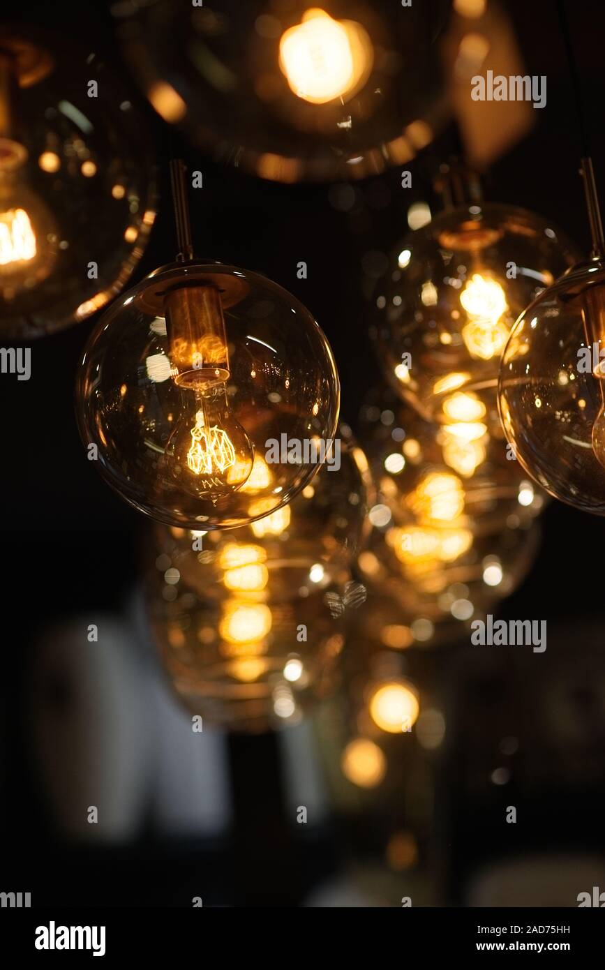 Decorative mason jar style yellow light bulbs Stock Photo - Alamy
