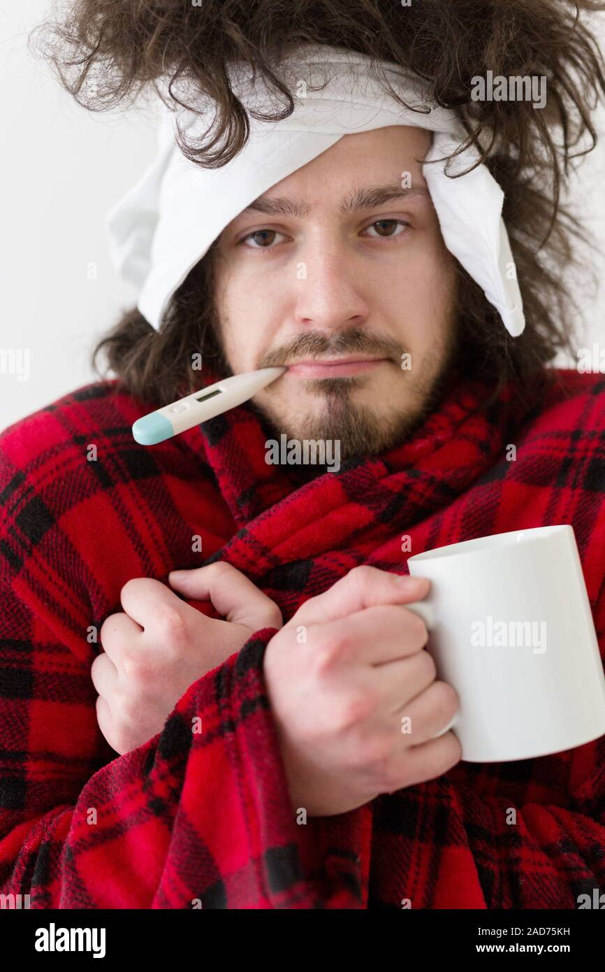 Man with flu and fever Stock Photo - Alamy