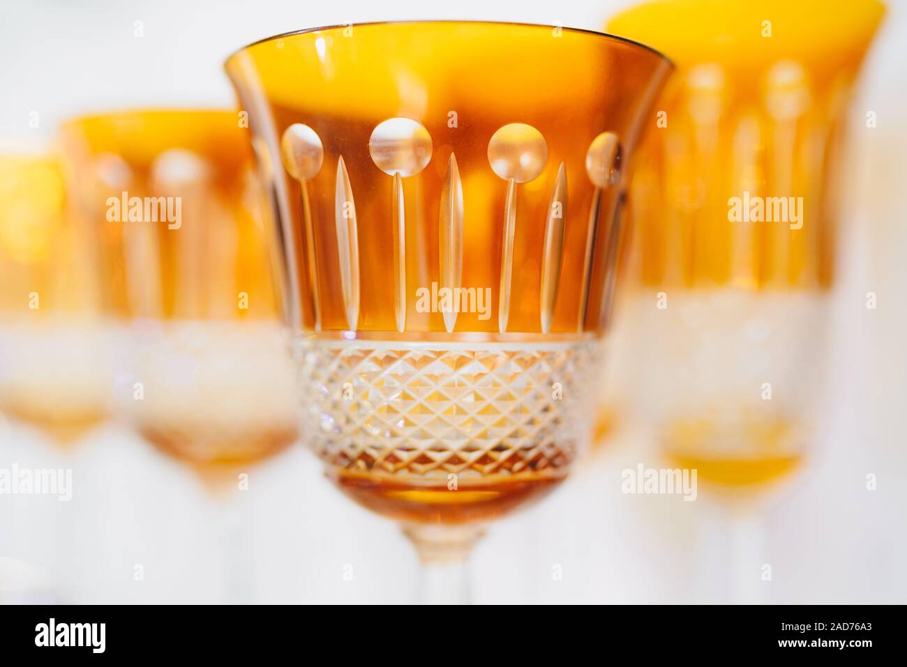 Orange glasses in a row - texture with light behind - for background ...