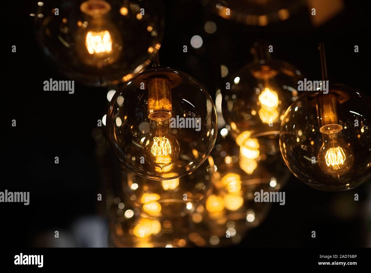 Decorative mason jar style yellow light bulbs Stock Photo - Alamy