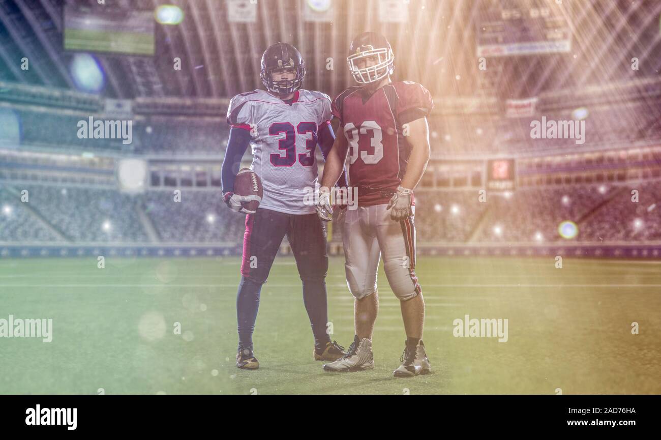 Two American football players standing on the field Stock Photo - Alamy Two American football players standing on the field Stock Photo - Alamy
