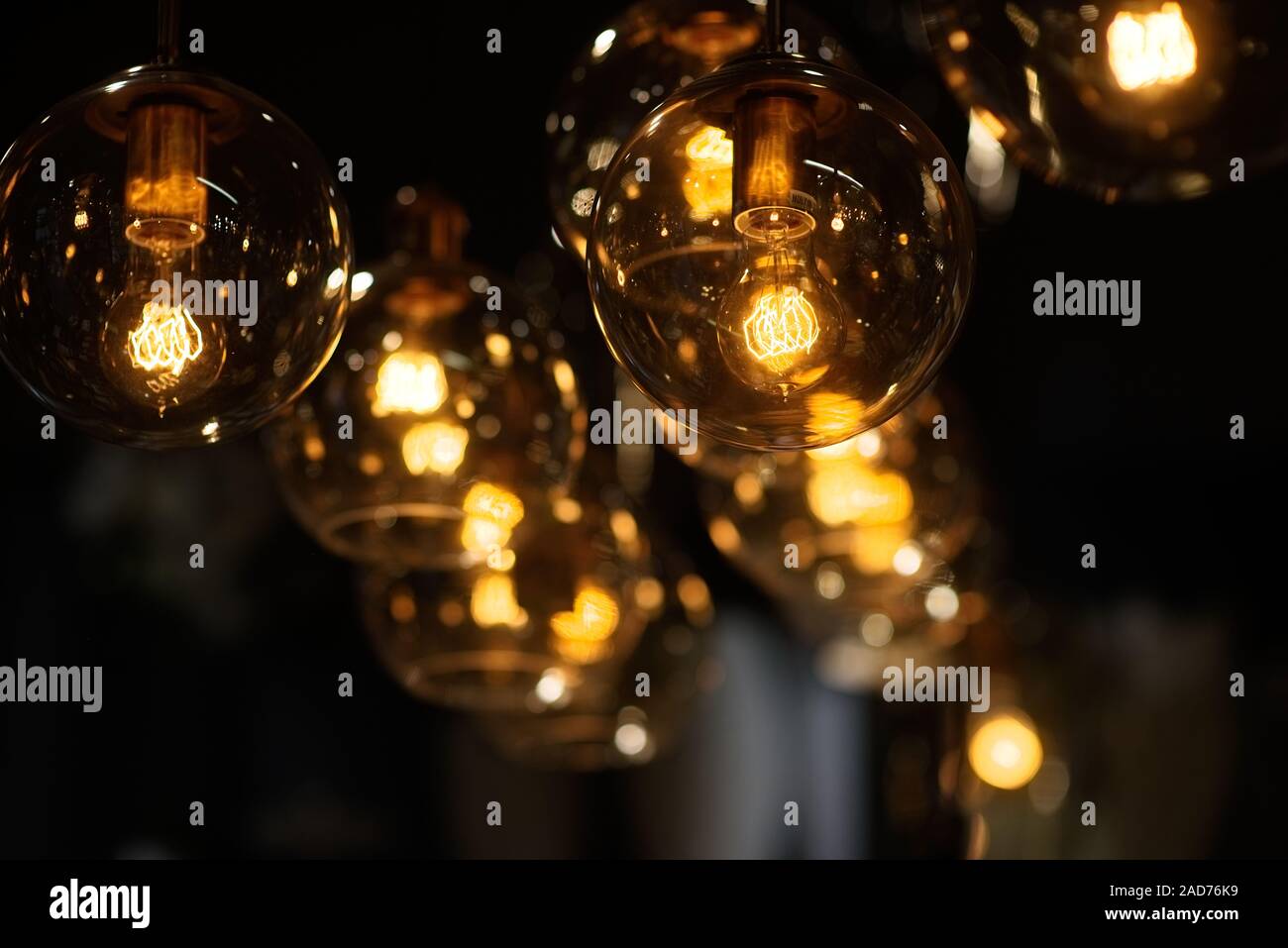 Decorative mason jar style yellow light bulbs Stock Photo - Alamy