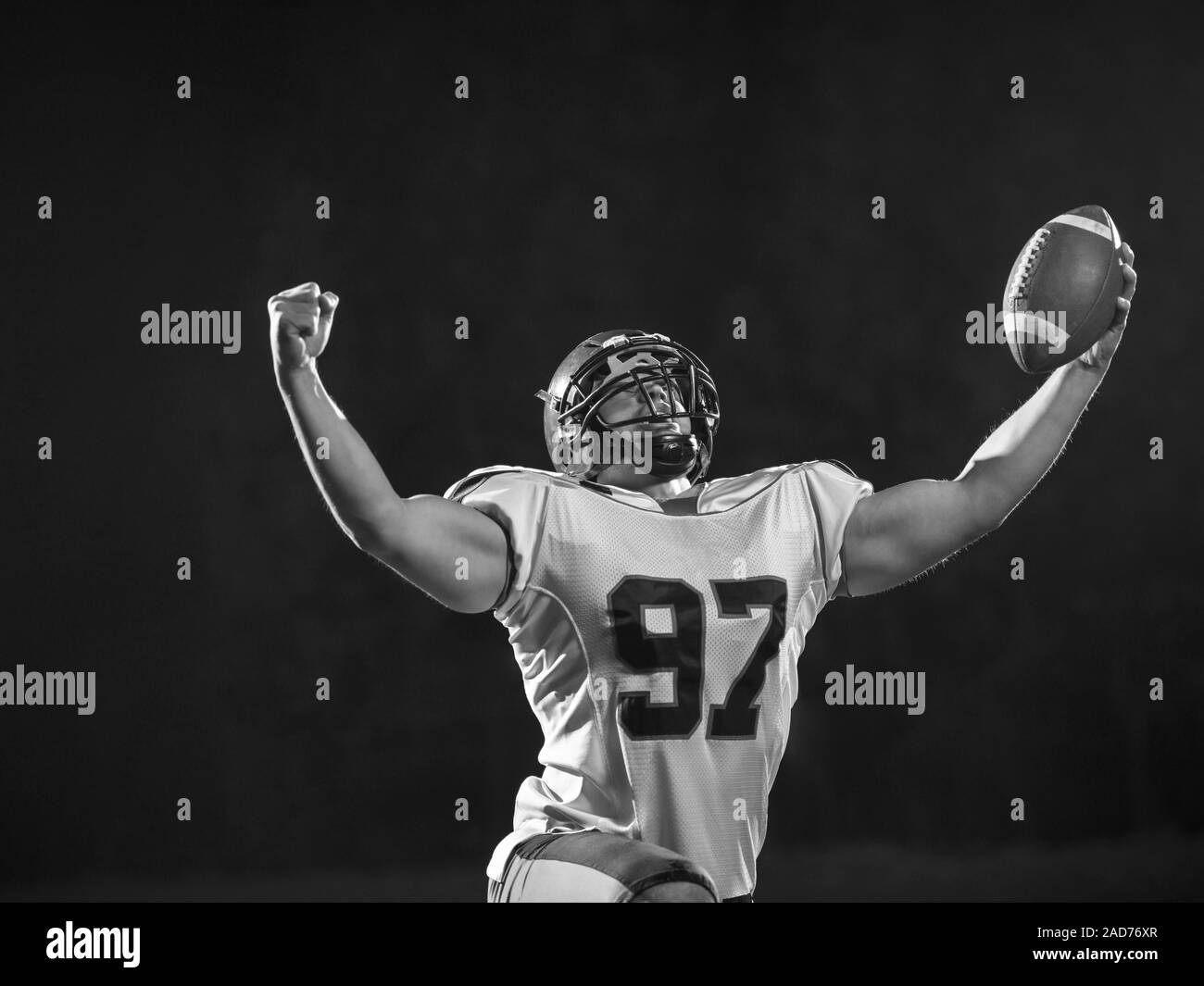 american football player celebrating after scoring a touchdown Stock ...