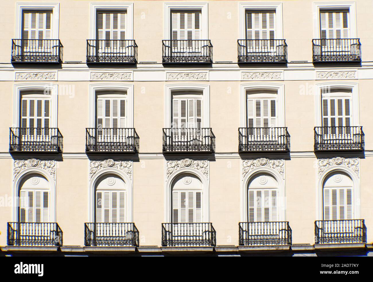 Facade with balconies seen in Madrid, Spain Stock Photo - Alamy