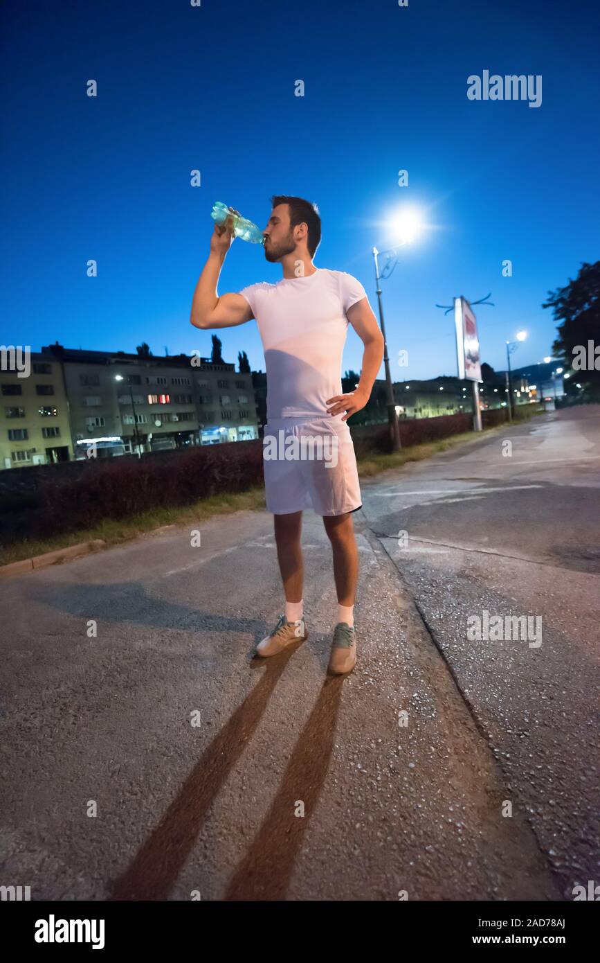 Athlete resting after running session hi-res stock photography and ...