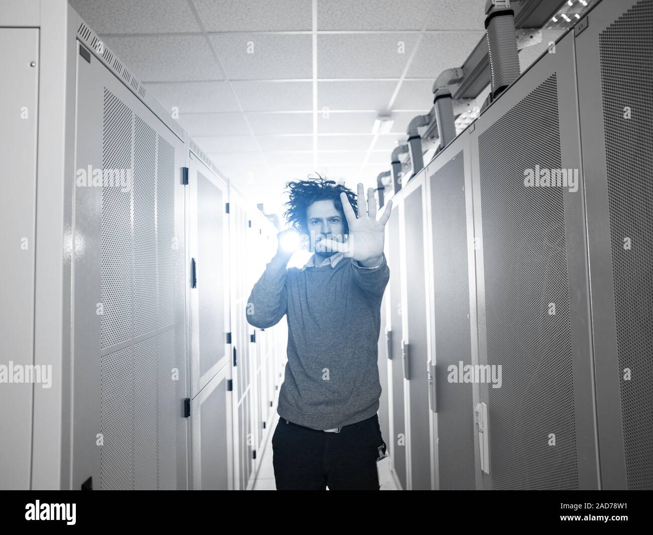 Man shining torch hi-res stock photography and images - Alamy